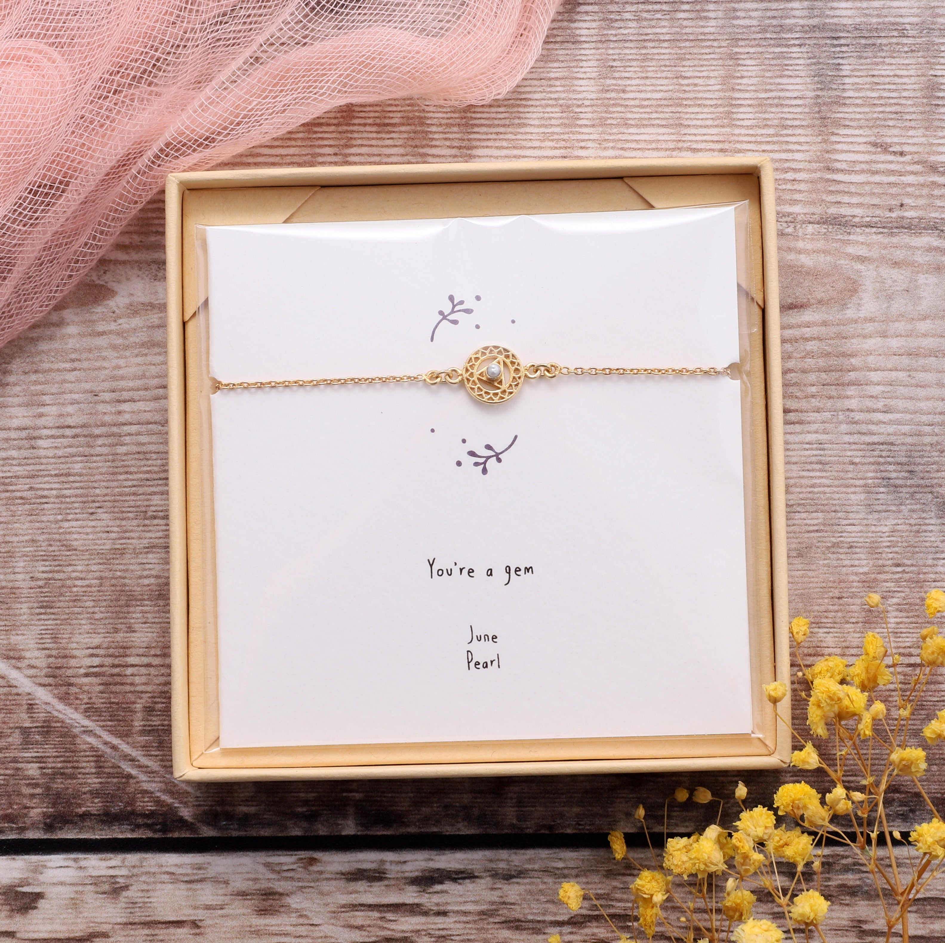 BB012 June Gold Birthstone Bracelet on card – attic creations